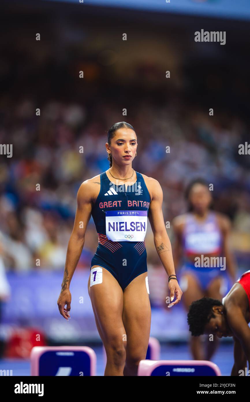 Laviai Nielsen participating in the 400 meters relay at the Paris 2024 ...