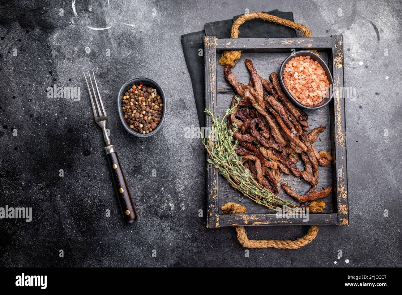 Beef fritter, Deep fried beef tender strips, sliced meat in a tray ...