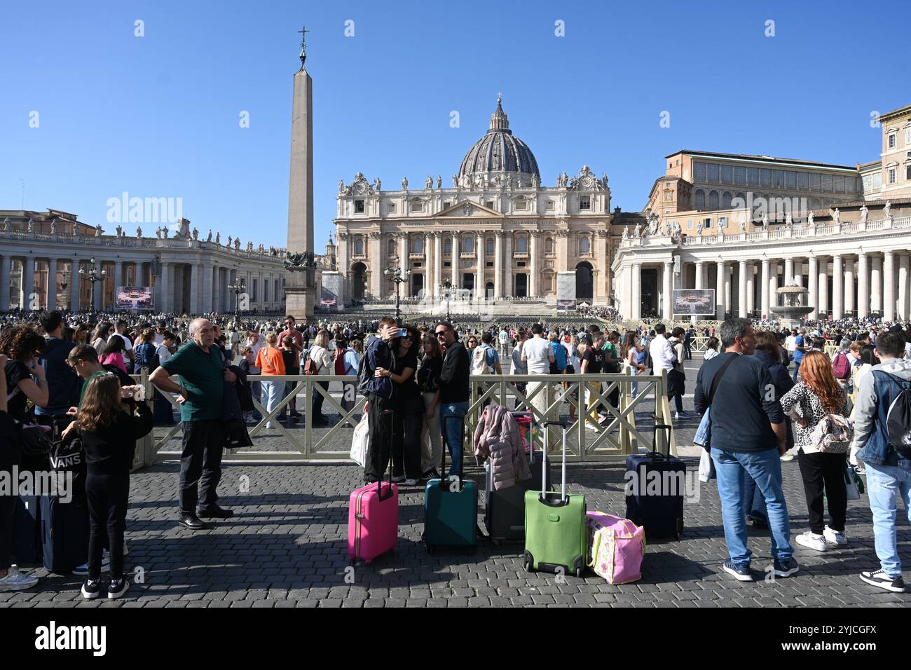 Vatican City - October 31, 2024: A crowd of tourists at the Saint Peter ...