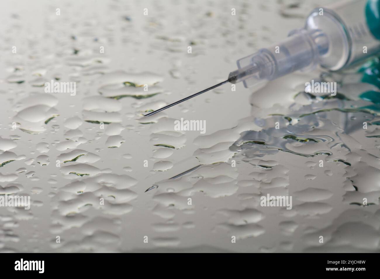 Concept photo of a medical injection needle Stock Photo - Alamy