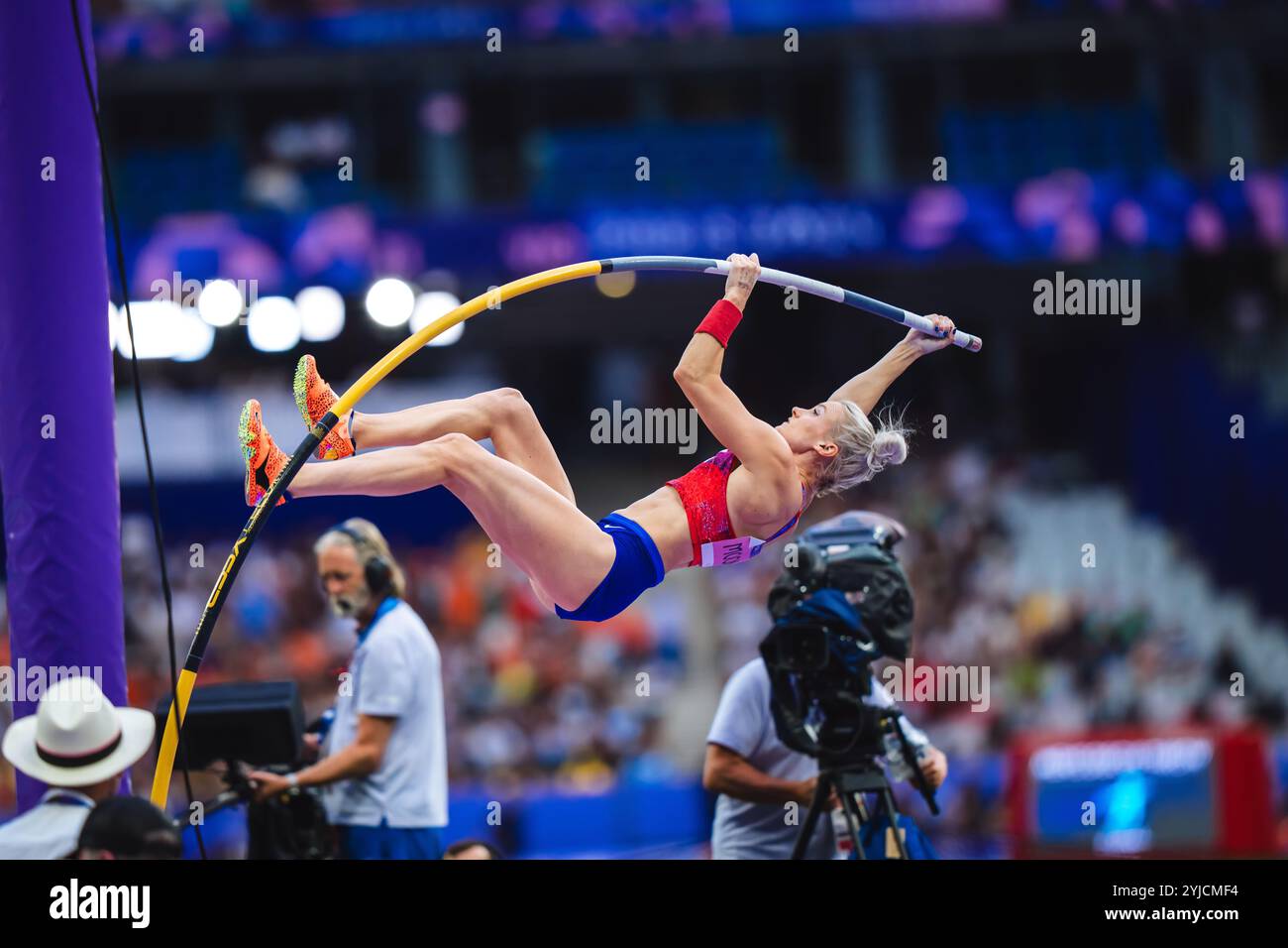 Katie Moon participating in the pole vault at the Paris 2024 Olympic ...