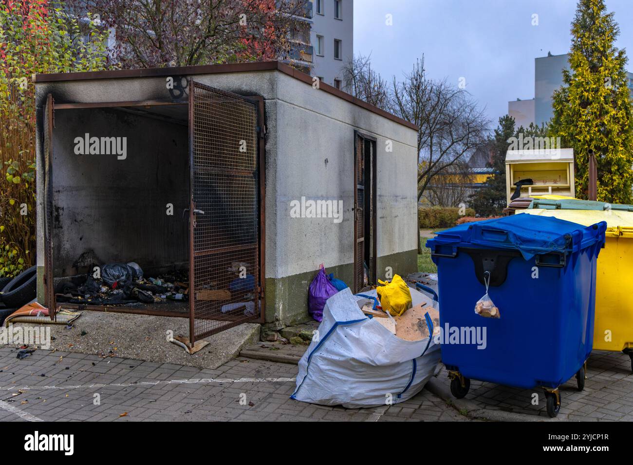 The arsonist set fire to garbage containers, burned garbage, action of ...