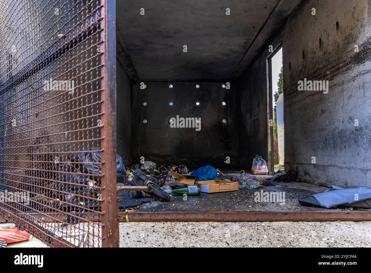 The arsonist set fire to garbage containers, burned garbage, action of ...