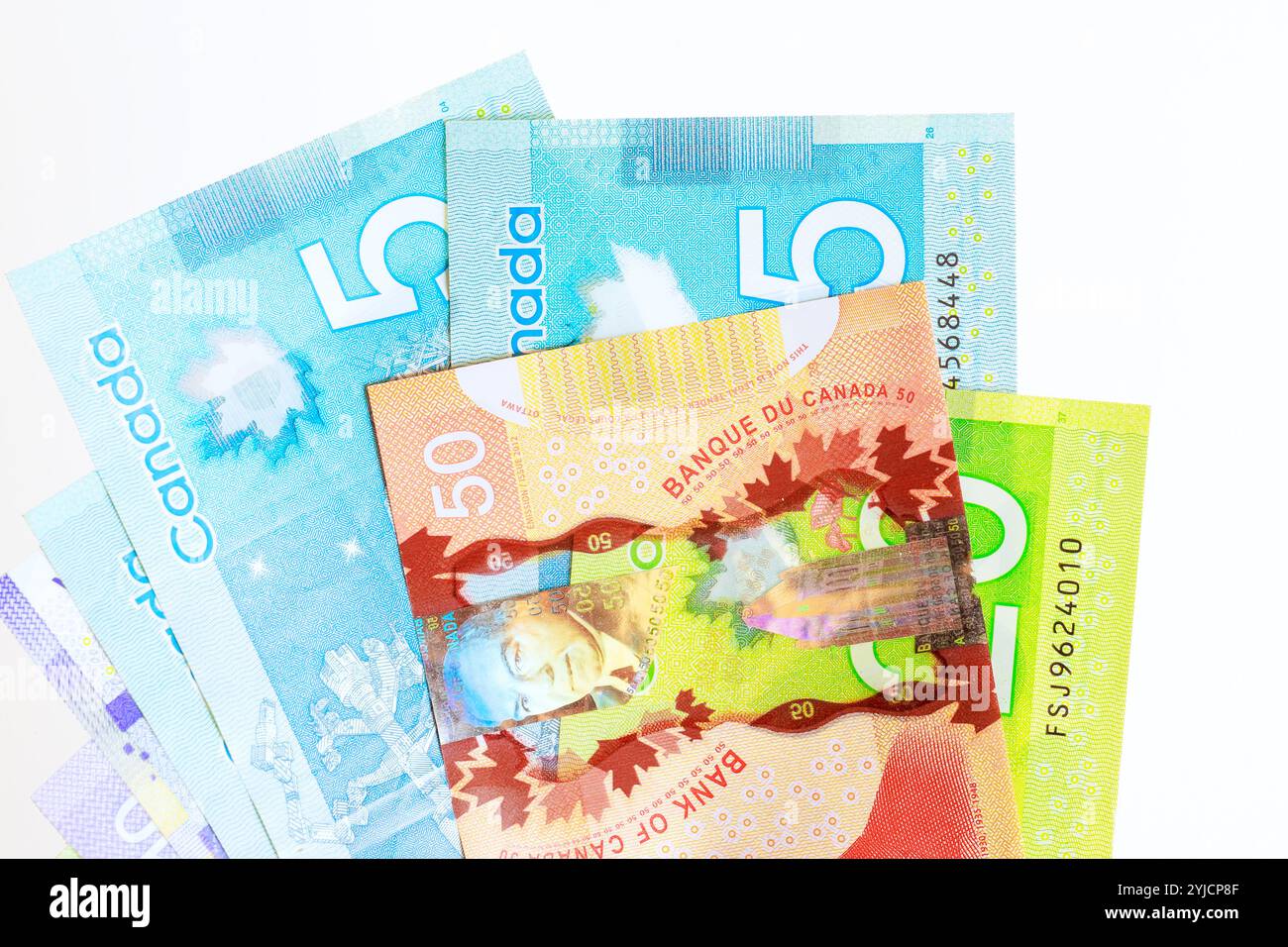 Hand holding various denominations hi-res stock photography and images ...