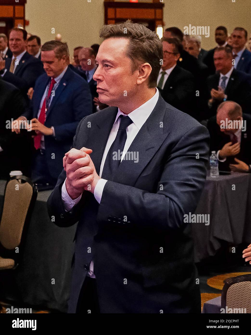 Tesla and SpaceX CEO Elon Musk (R) listens as United States President ...