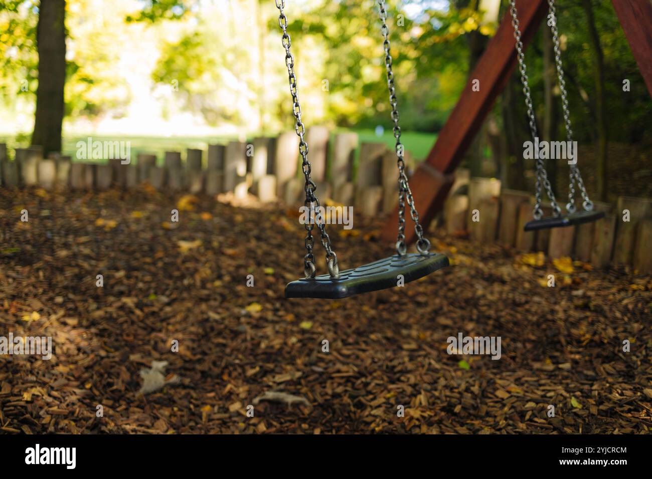 Empty swing swinging on wind hi-res stock photography and images - Alamy