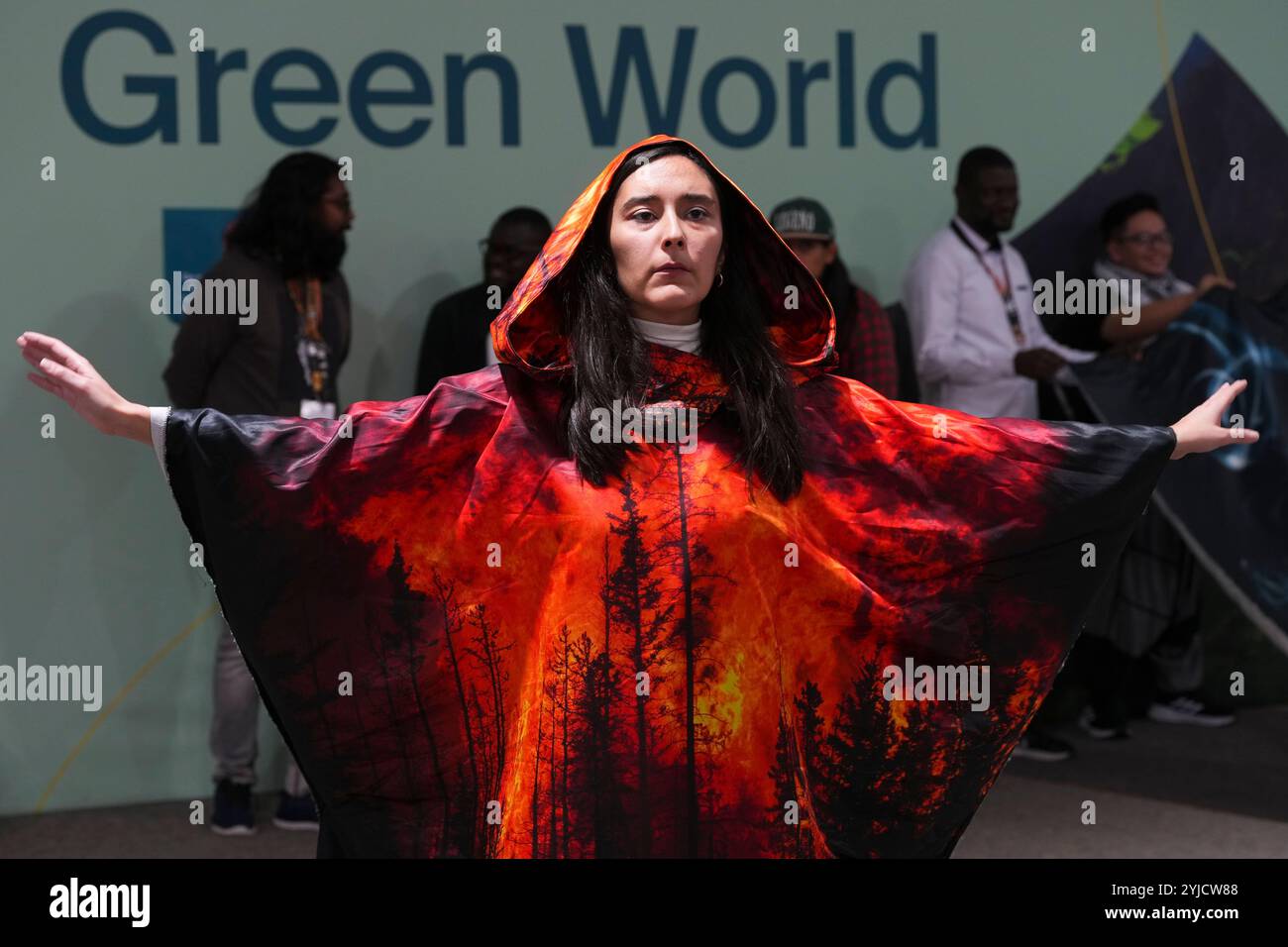 An activist participates in a demonstration dressed with images of ...