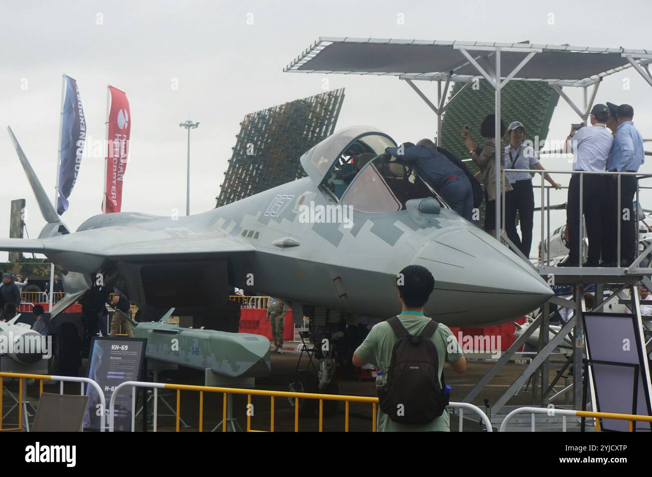 Visitors check out a Sukhoi Su-57, Russian's fifth-generation fighter ...