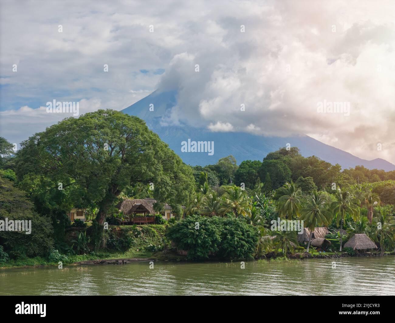 Lush vegetation surrounds calm river hi-res stock photography and ...