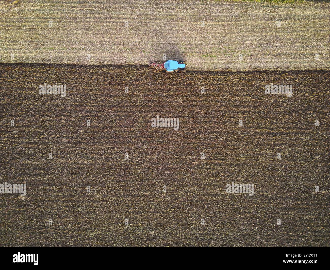 Tractor on plowed field top hi-res stock photography and images - Alamy
