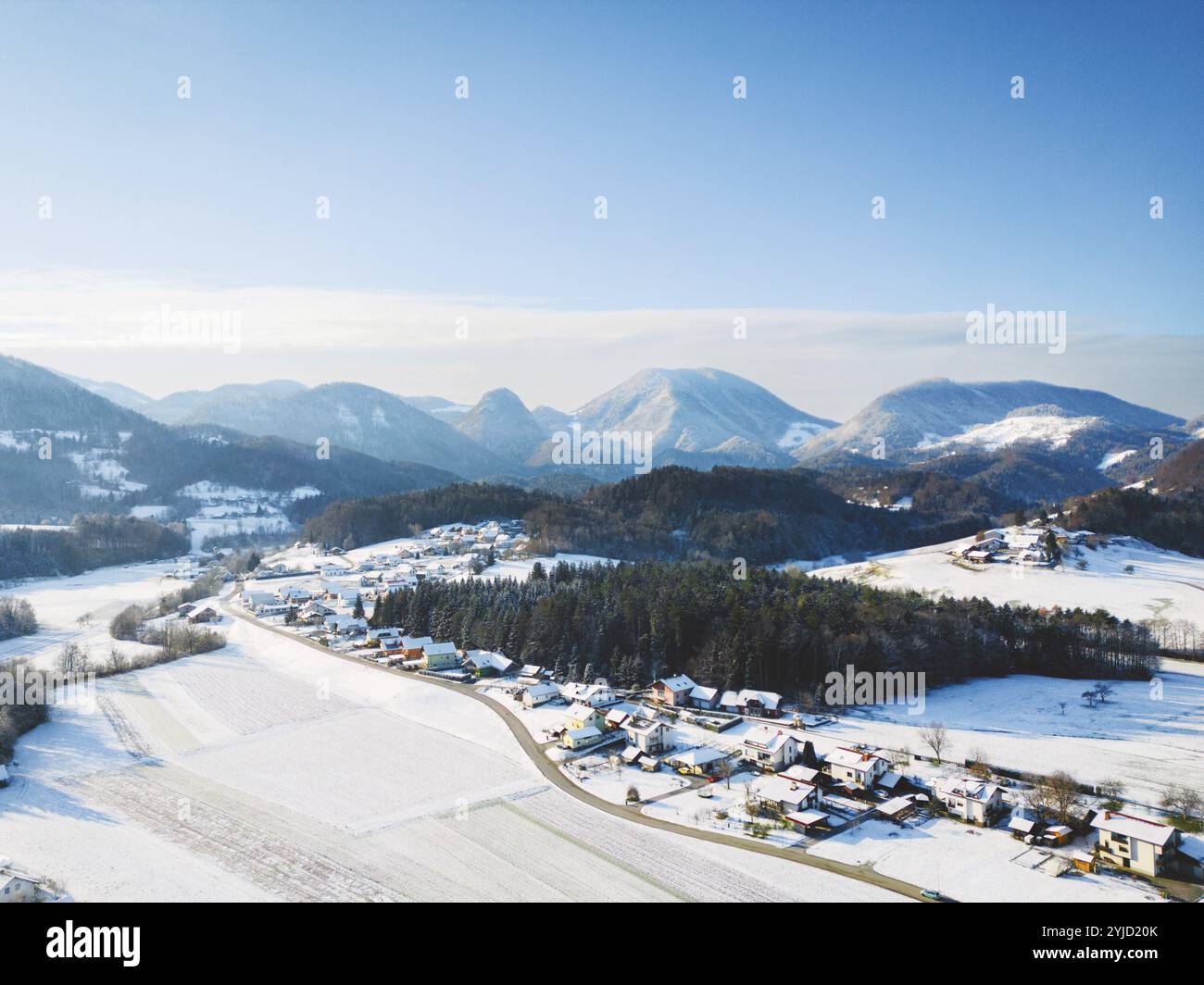 Aerial view of small winter town, snow on the grounds, sunny winter day ...