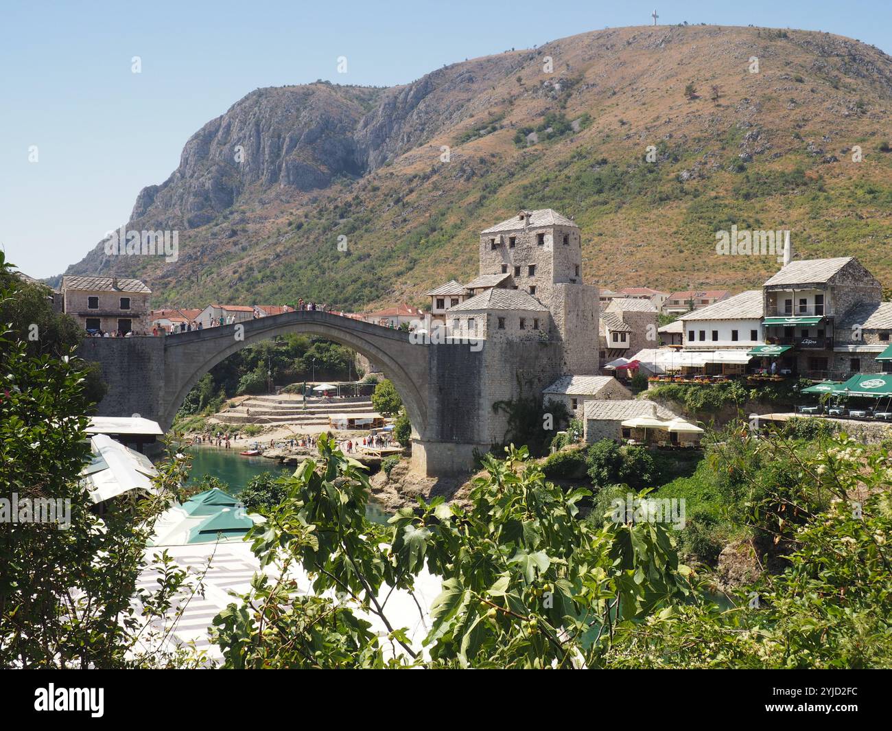 Famous Mostar bridge in Bosnia and Herzegovina on Neretva river. People ...