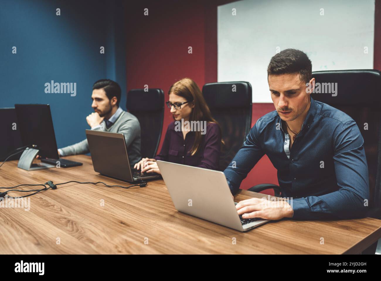 Start up company, young caucasian business people at work ...