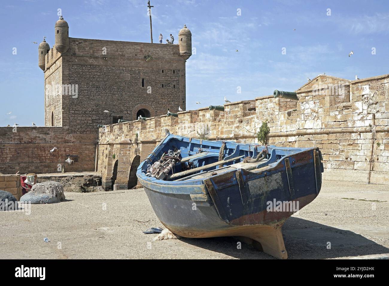 The boat and the fortress in the fishing harbour of Esaaouira Stock ...