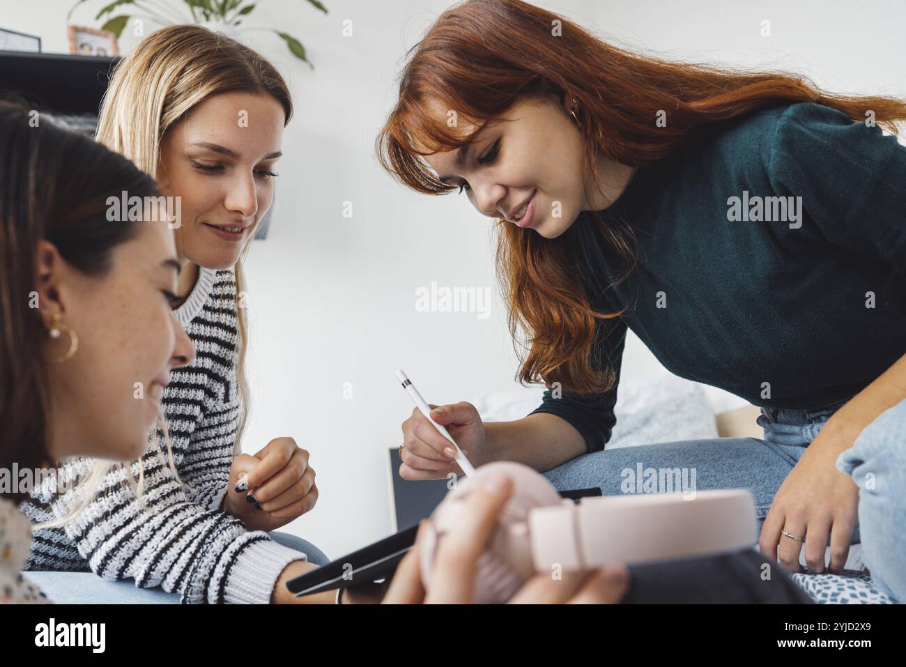 Group of three roommates, college student, young caucasian women ...