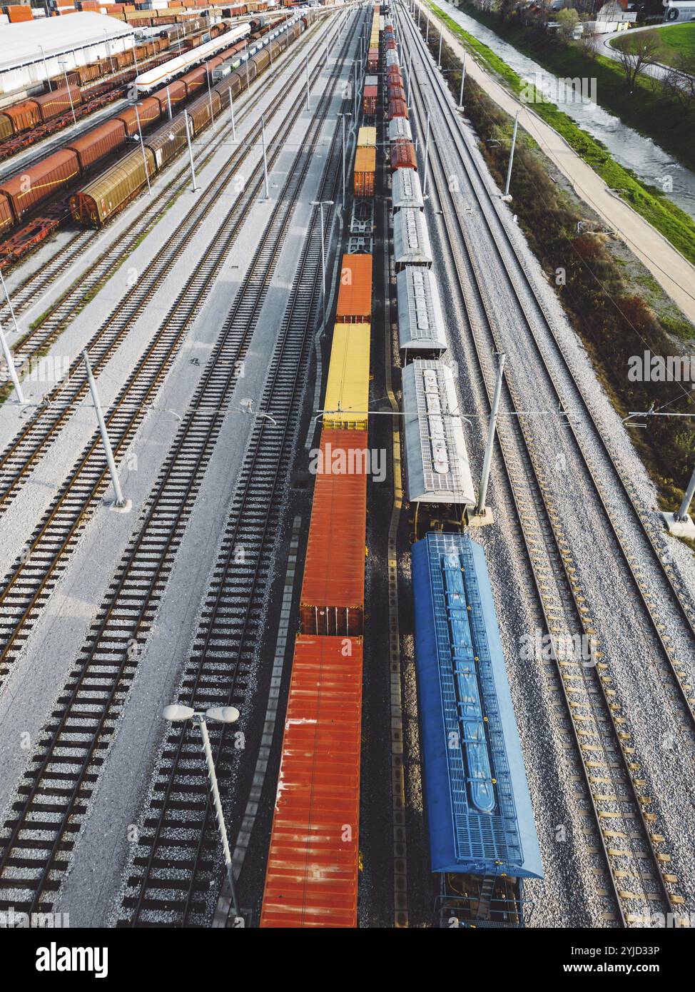 Cargo trains close-up. Aerial view of colorful freight trains on the ...