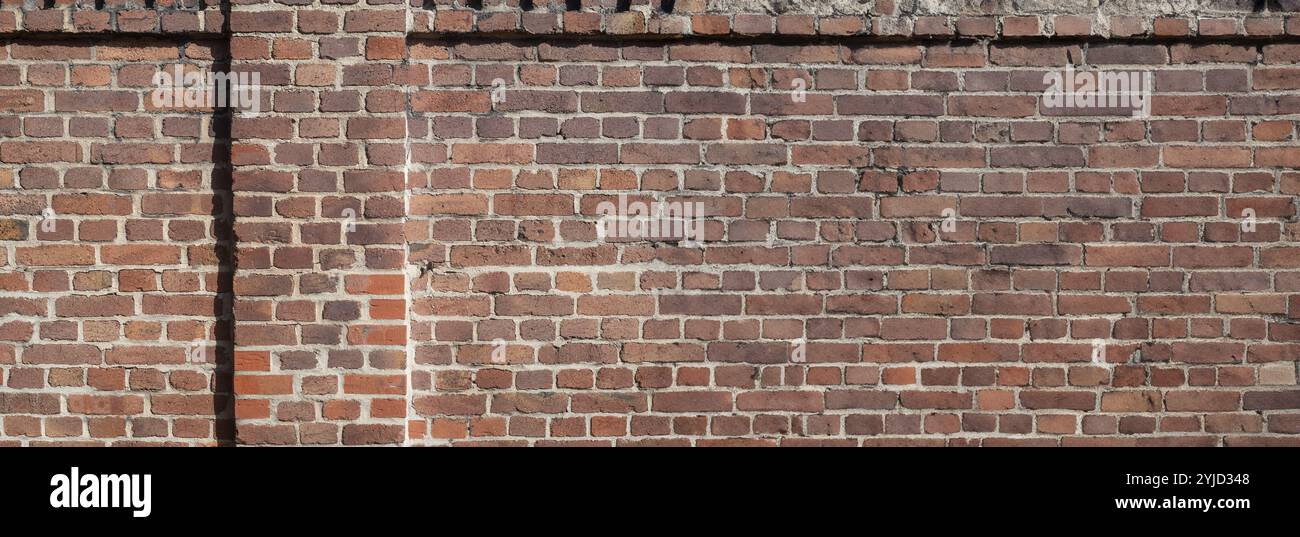 Uniform brick wall with no recognisable features, Bottrop, North Rhine ...