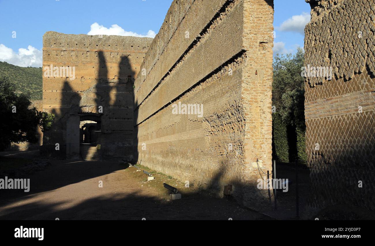 Long wall, ruins, shadows Stock Photo - Alamy