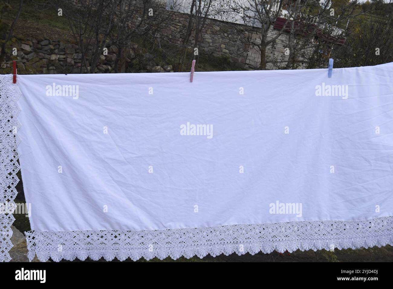 Drying laundry hanging on clothesline garden outside hi-res stock ...