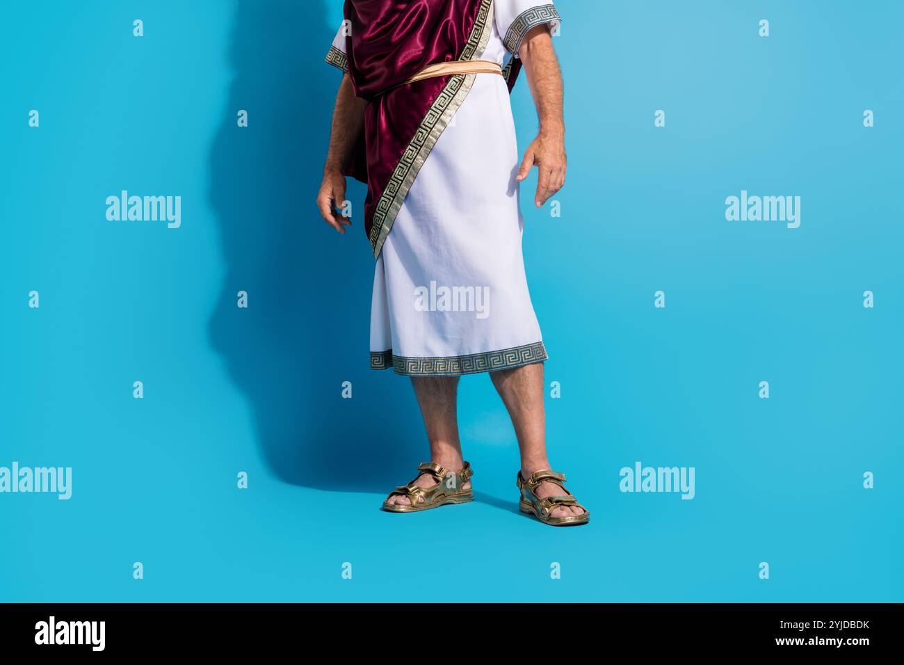 Cropped photo of old man legs sandals dressed greek god emperor actor ...