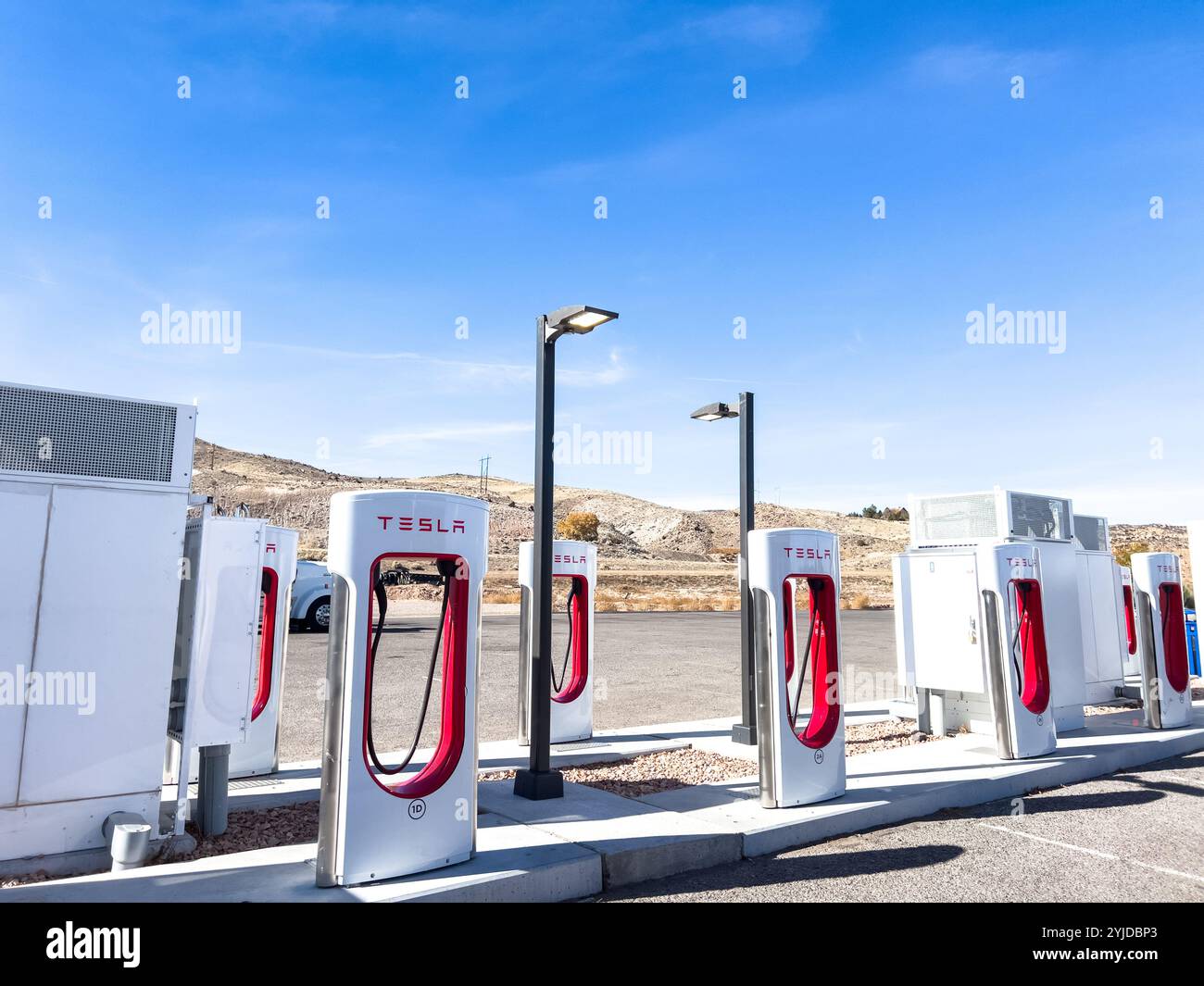Side View of Tesla Cybertruck Charging at Supercharger Station Stock ...