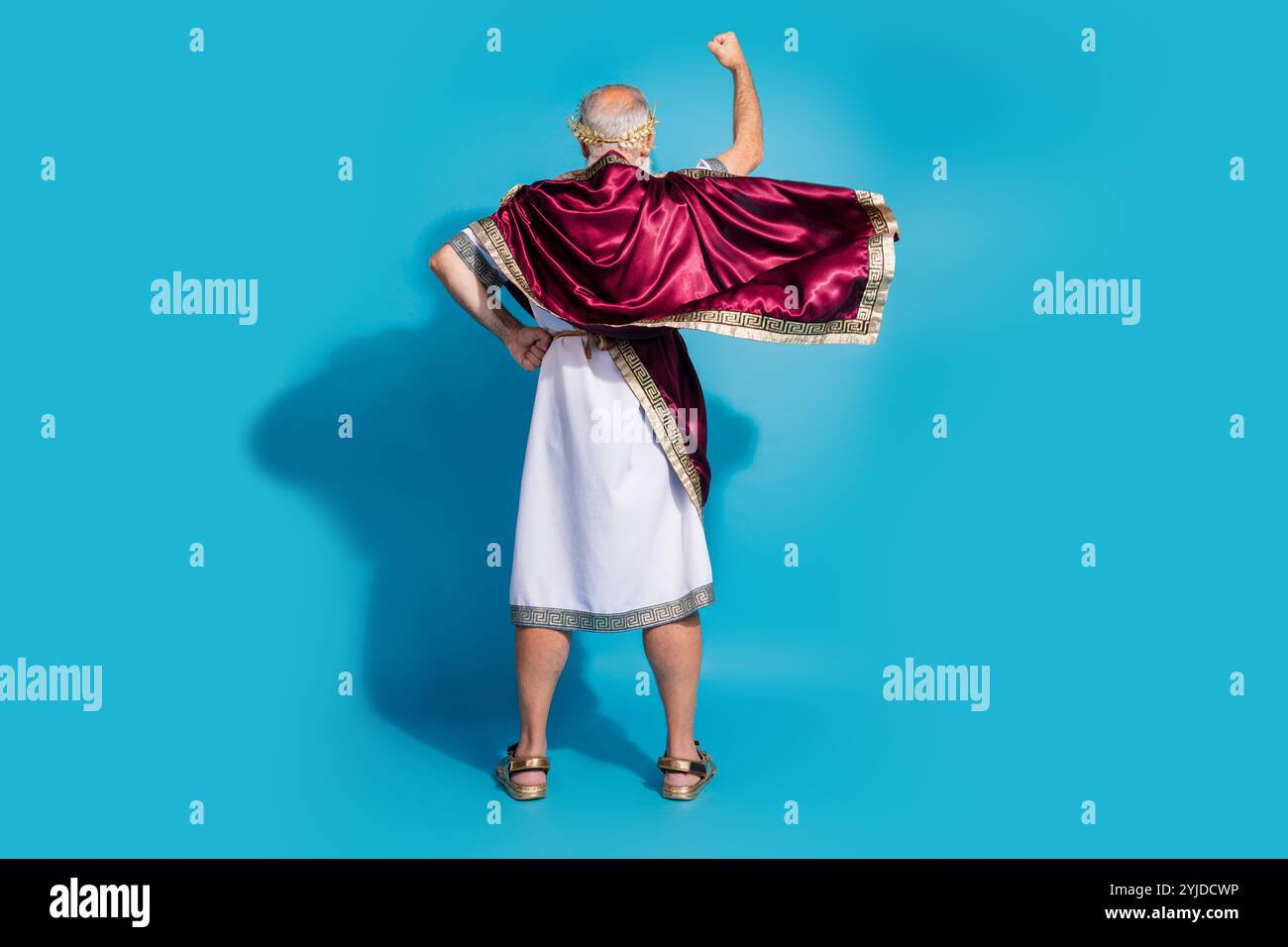 Full size photo of powerful mature man back view raise fist winner wear ...