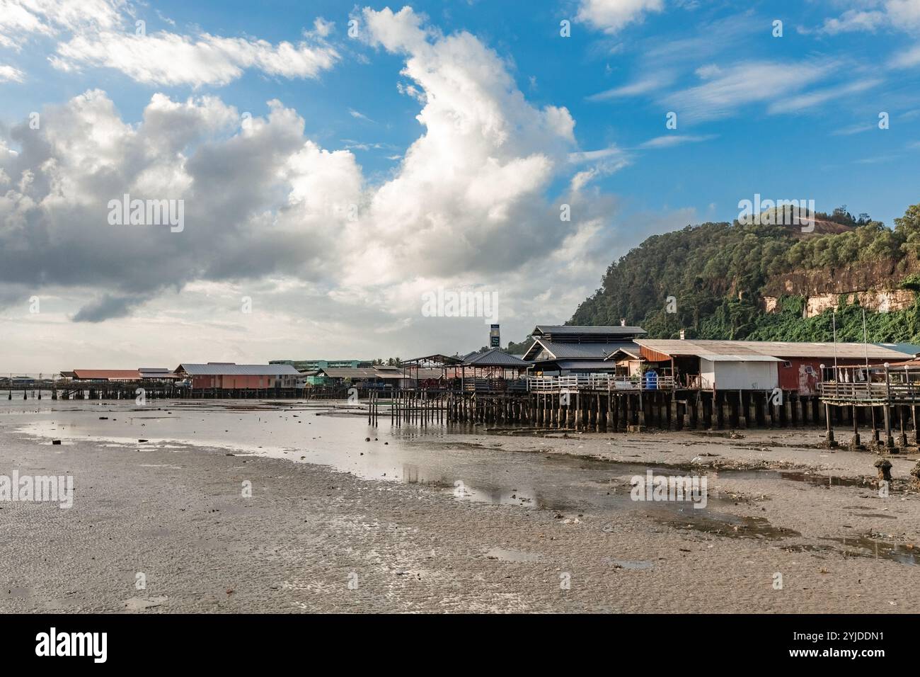 Fishing village houses over the water garbage poor areas in Sabah ...