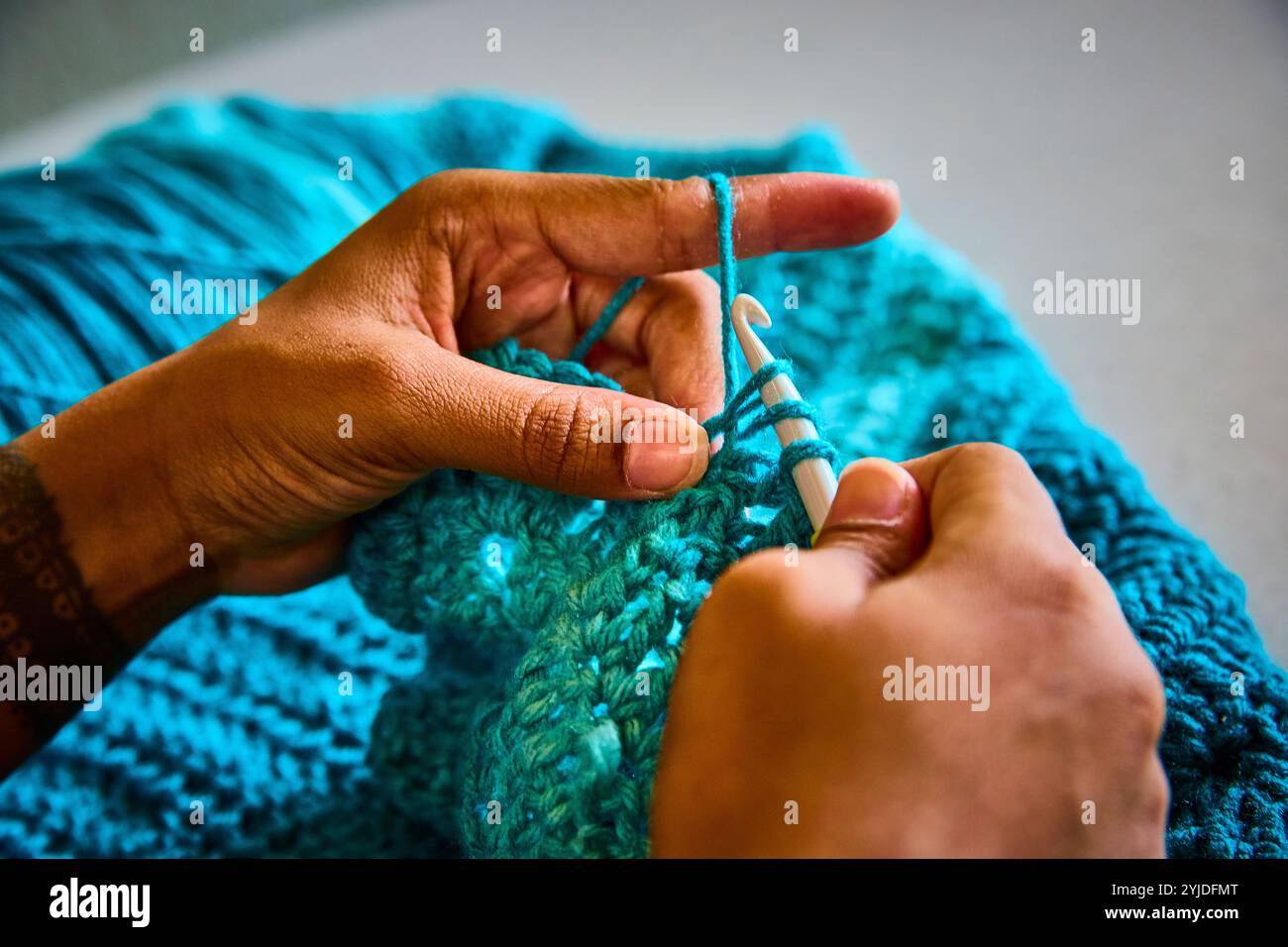 Hands Crafting Blue Yarn Crochet Close-Up Stock Photo - Alamy