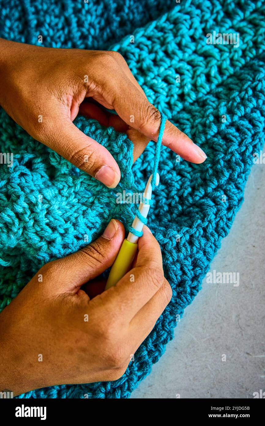 African American Hands Crocheting with Blue Yarn Close-Up Motion Stock ...