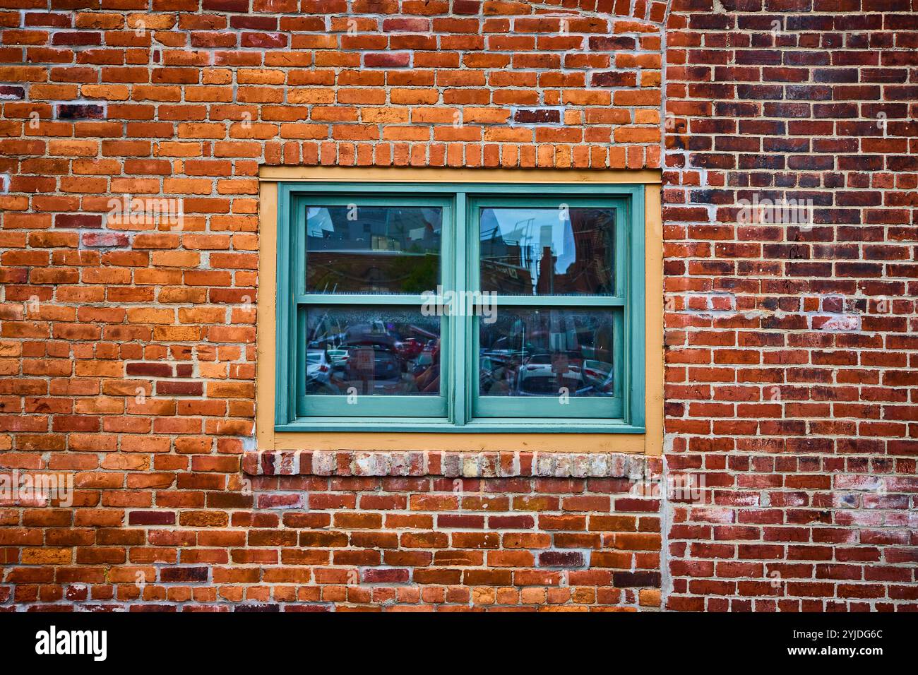 Historic Brick Wall with Reflected Urban Scene at Eye Level Stock Photo ...