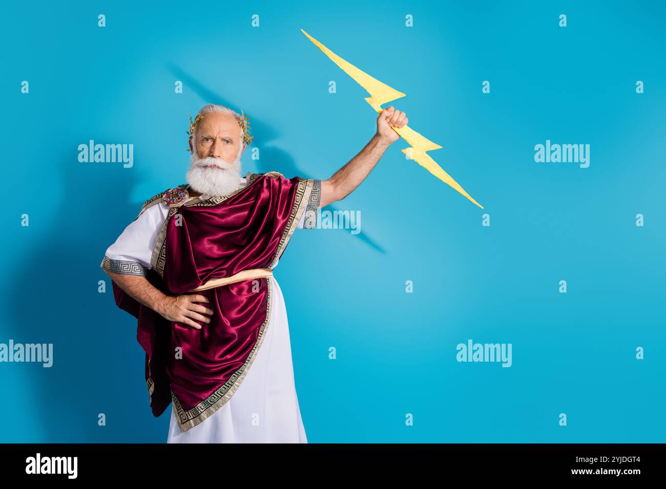 Photo of attractive old man throw storm lightning dressed greek god ...
