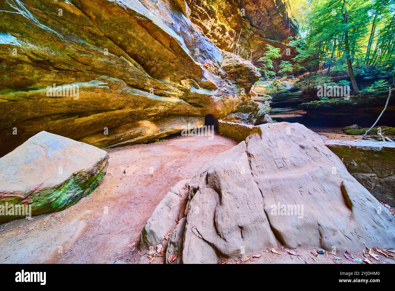 Eroded Rock Wall with Cave and Graffiti on Old Mans Cave Trail Eye-Level View Stock Photo - Alamy