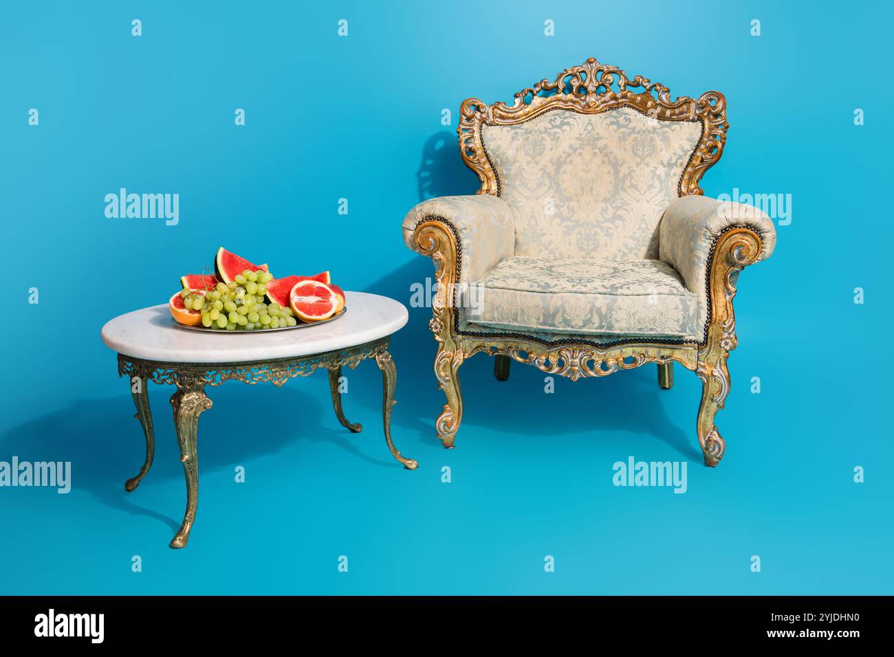 Photo of antique ancient luxury ornament throne chair fruit tray table ...