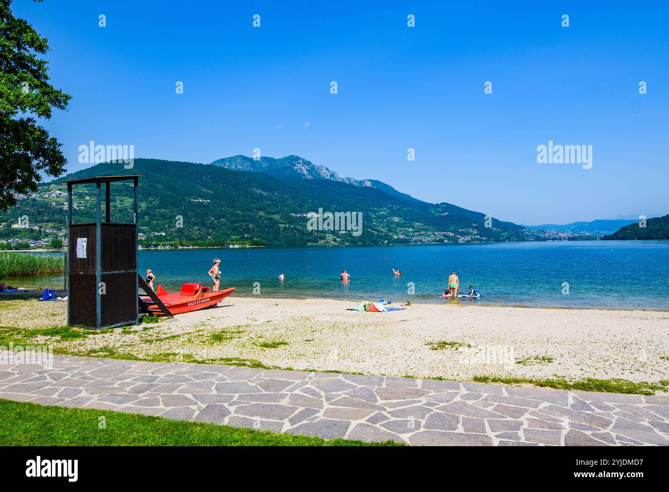LEVICO TERME, ITALY – AUGUST 26, 2024: Lake Levico, located in Trentino ...