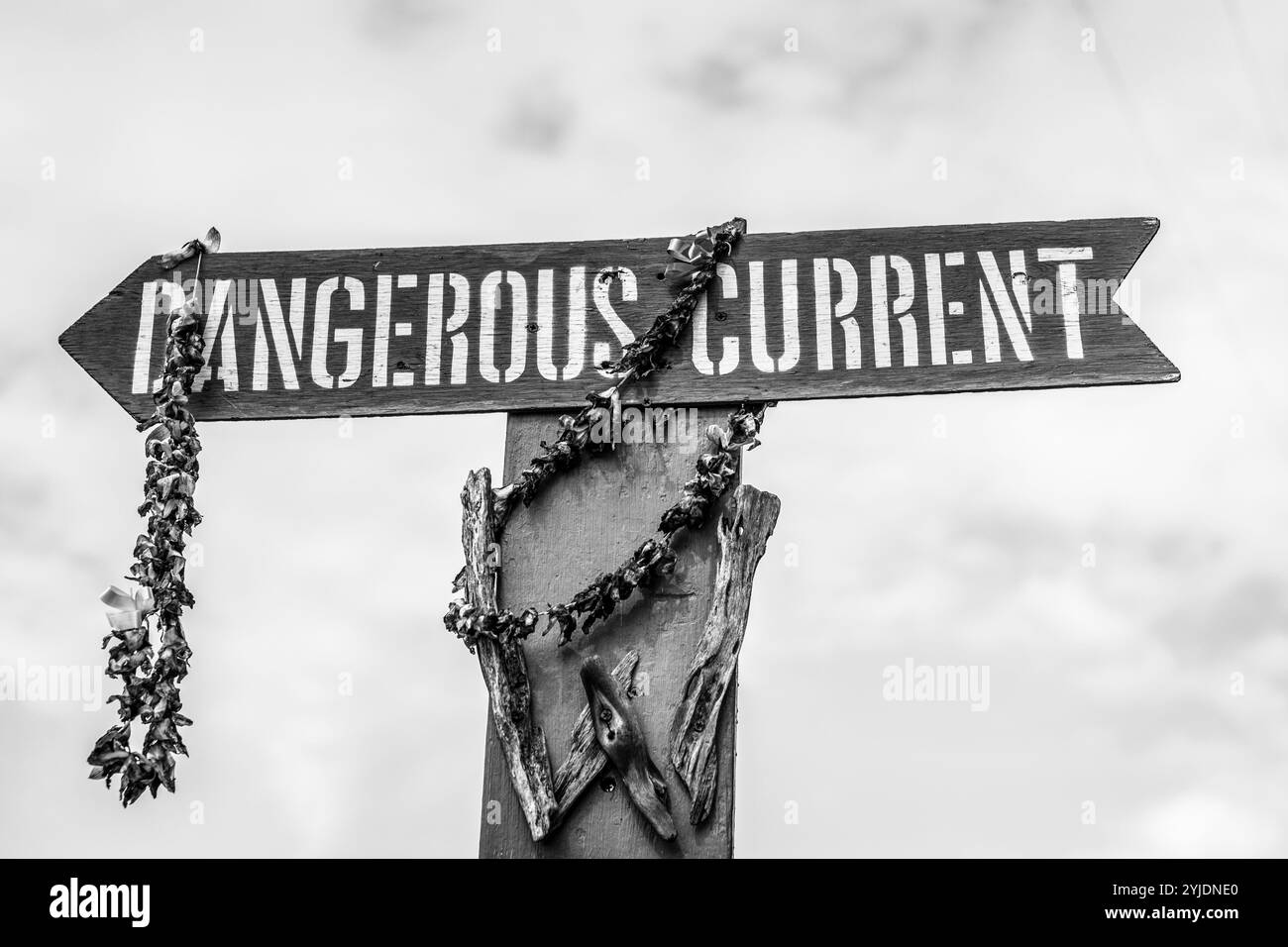 Dangerous current beach sign Black and White Stock Photos & Images - Alamy
