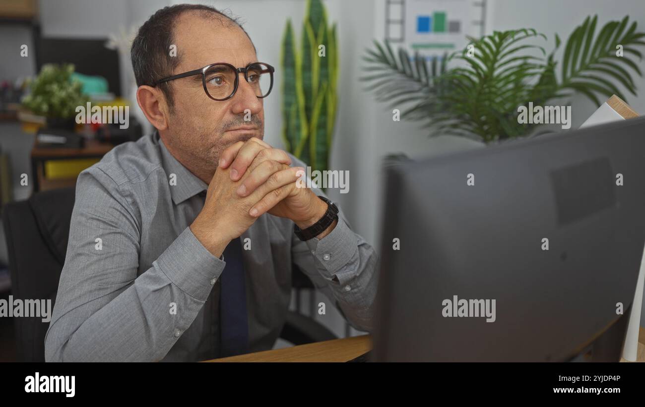 Professional bald man glasses engaged hi-res stock photography and ...