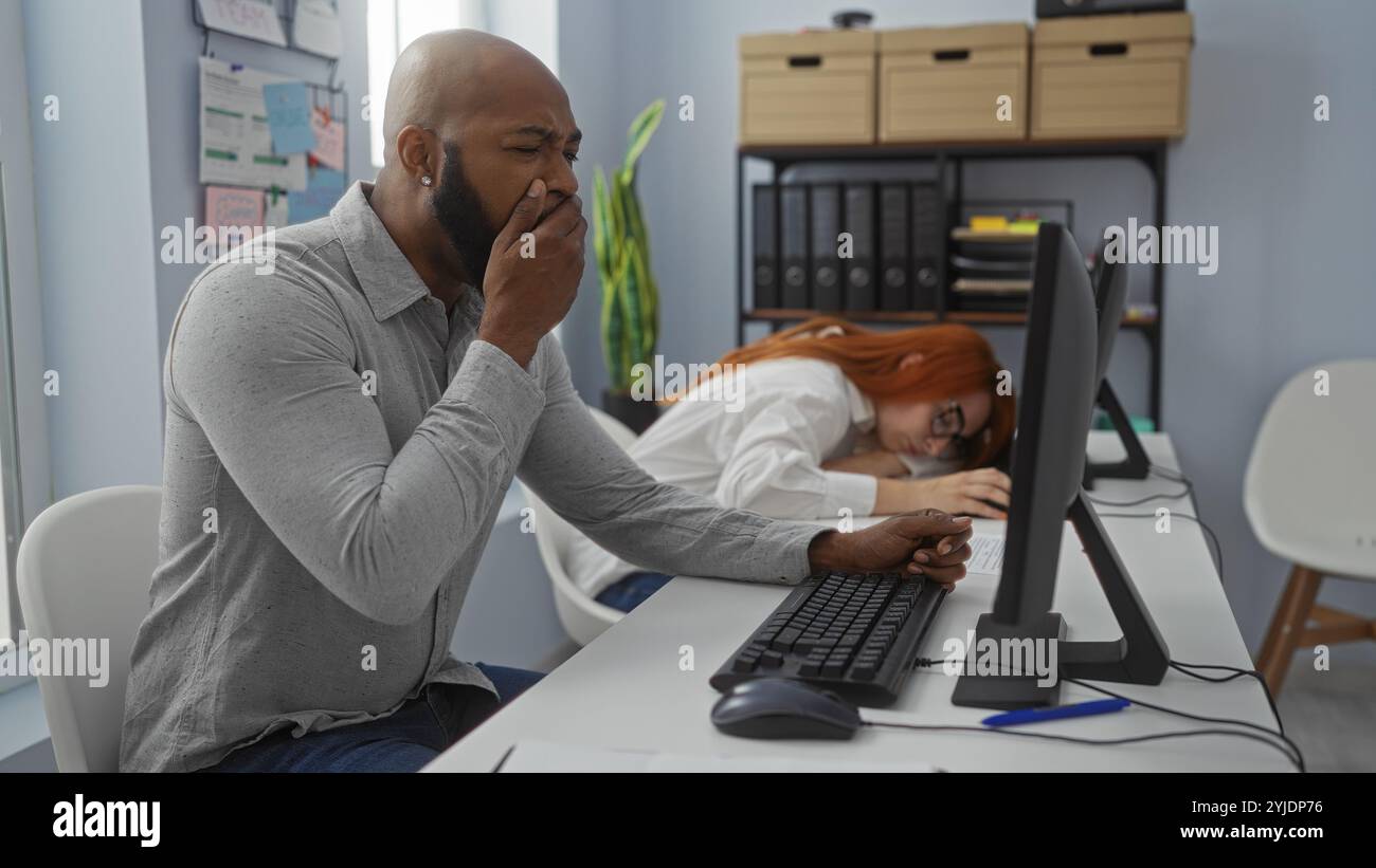 Office workers sleeping at desk hi-res stock photography and images - Alamy