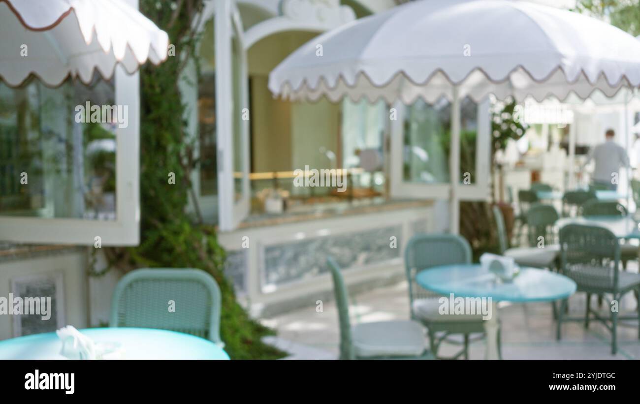 Outdoor dining area with blurred background of elegant luxury ...