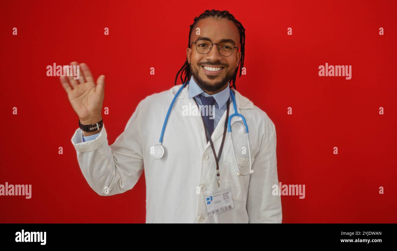Portrait male doctor waving welcoming hi-res stock photography and ...