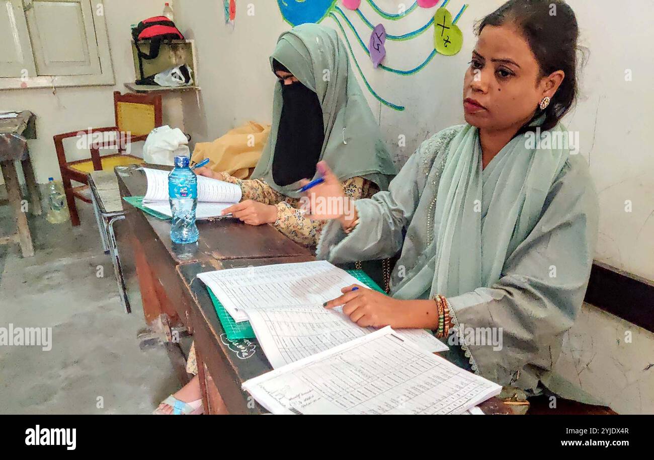 SUKKUR, PAKISTAN, NOV 14: The ballot casting process is underway at ...