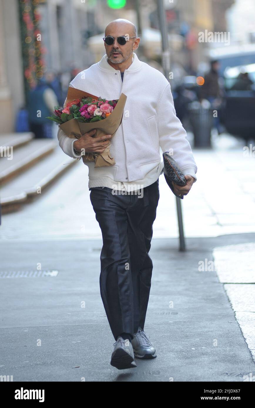 Milan, 11/14/2024 Enzo Miccio caught while buying a bouquet of flowers ...