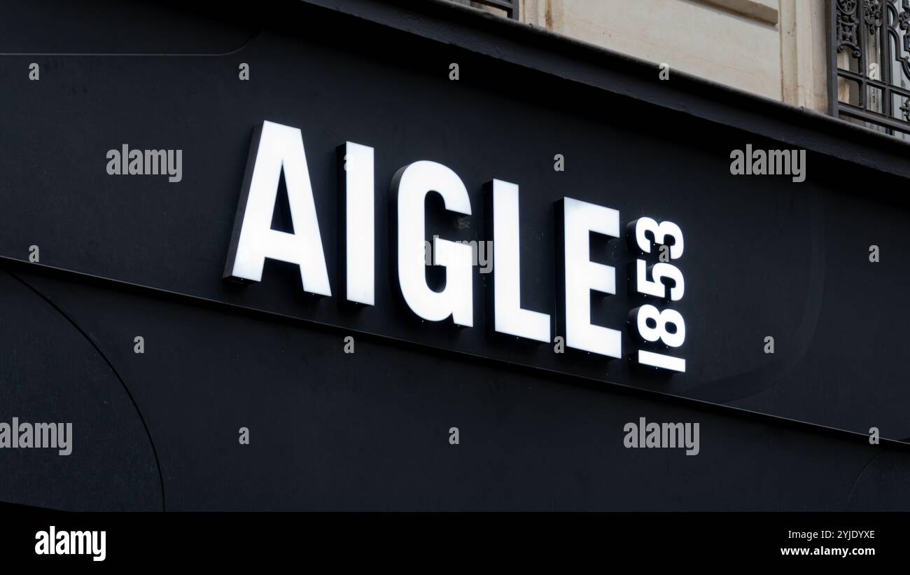 Sign and logo of an Aigle boutique in Paris, France. Aigle is a French ...