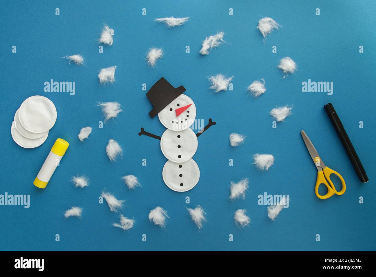 Easy Winter Craft for kid. Winter card Snowman from cotton disc on blue ...