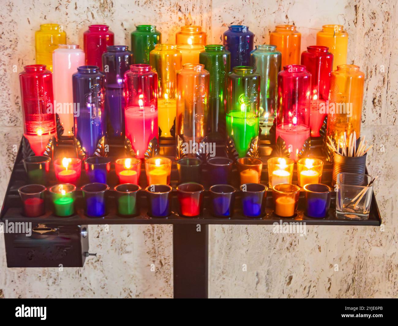 Prayer candles for pray and hope with god in church Stock Photo - Alamy