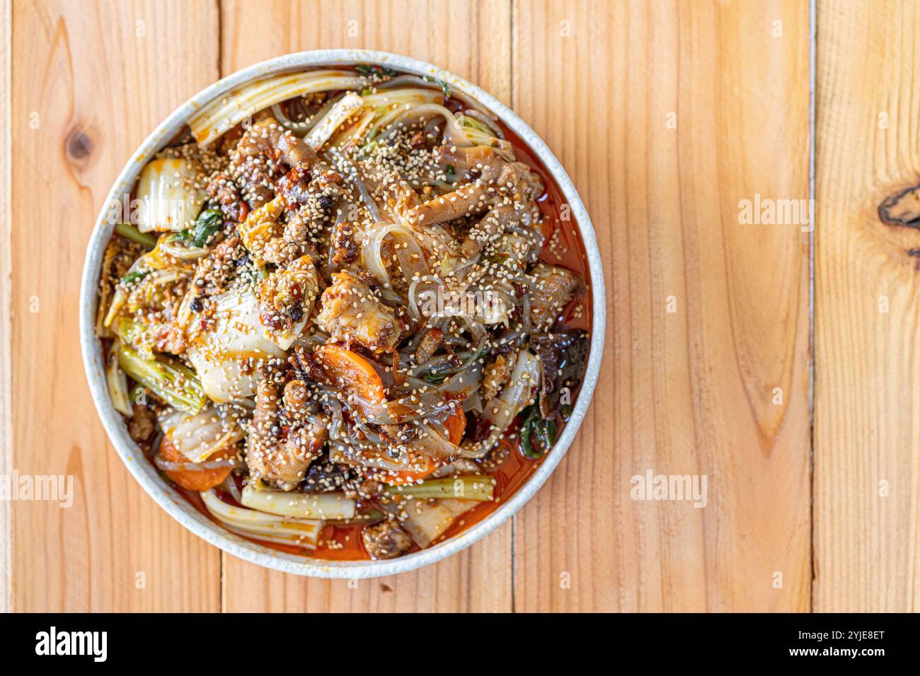 Various kinds of noodles are stir fried together with vegetables and ...