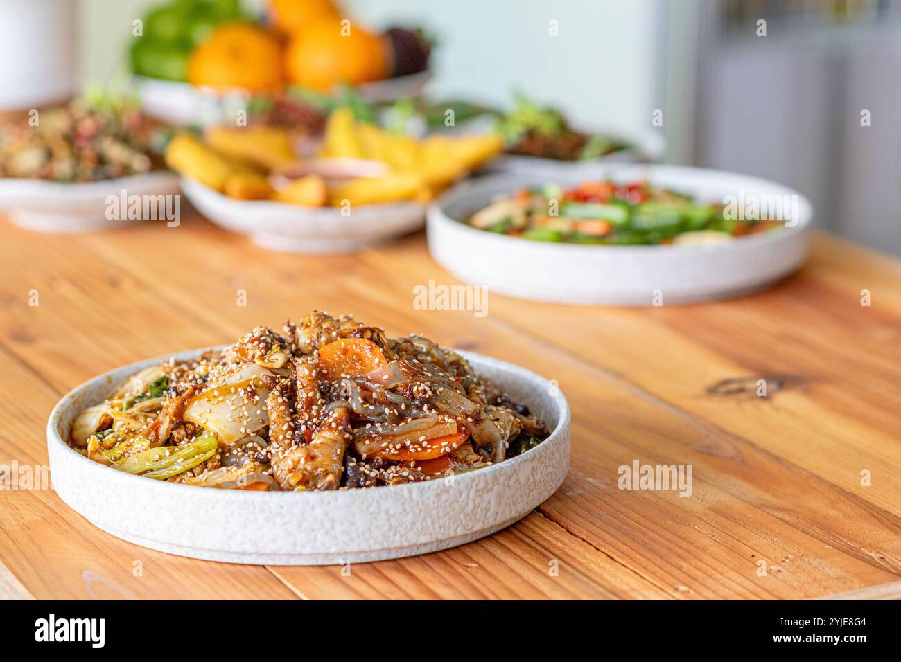 Various kinds of noodles are stir fried together with vegetables and ...