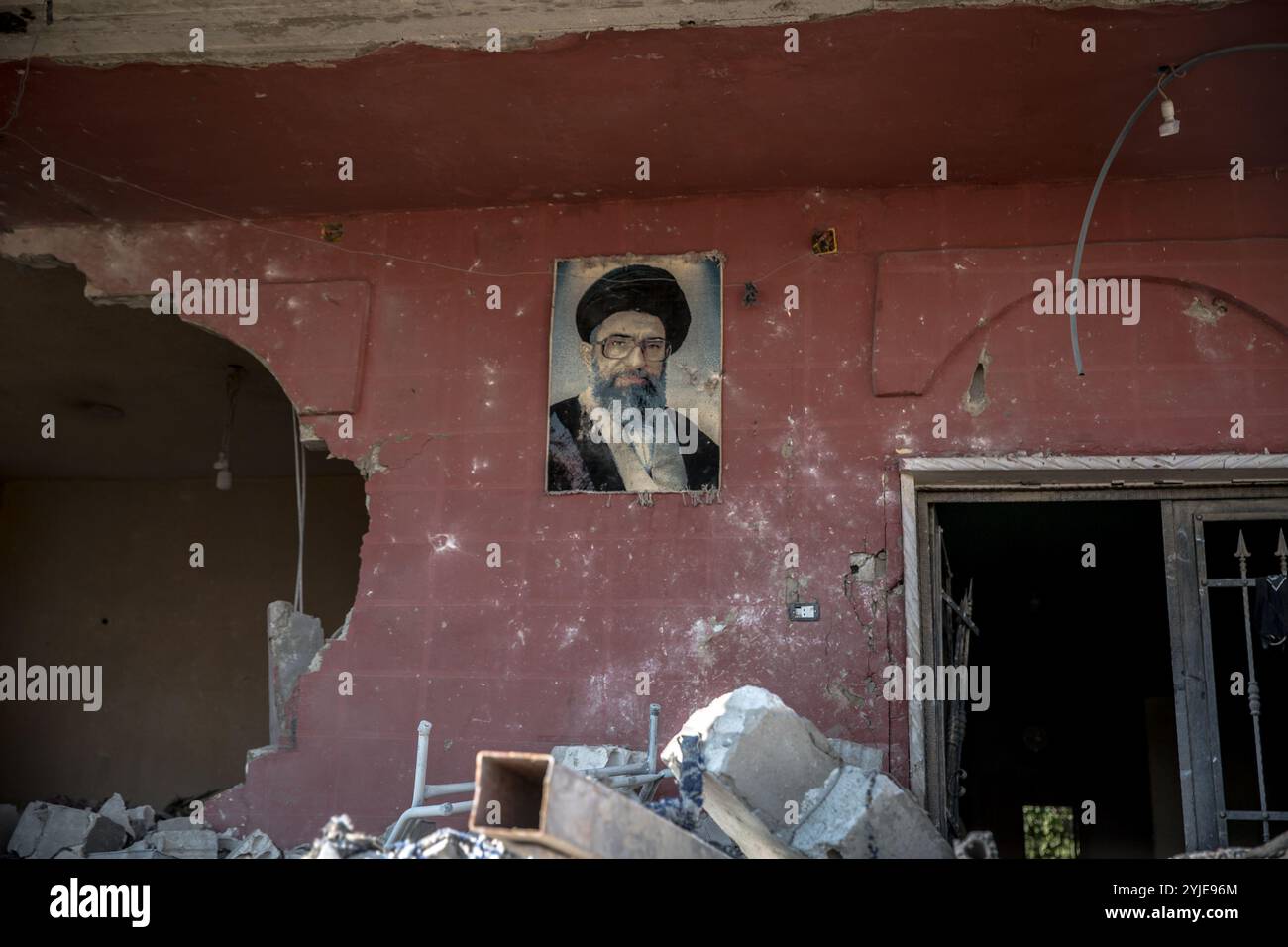 A photo of Iranian Supreme leader Ali Khamenei seen on the wall of a ...