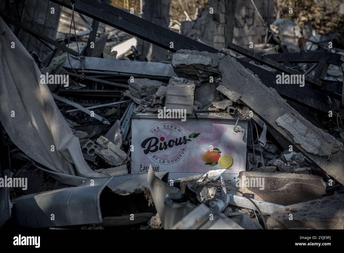 An ice-cream freezer lying in the rubble after a restaurant was hit by ...