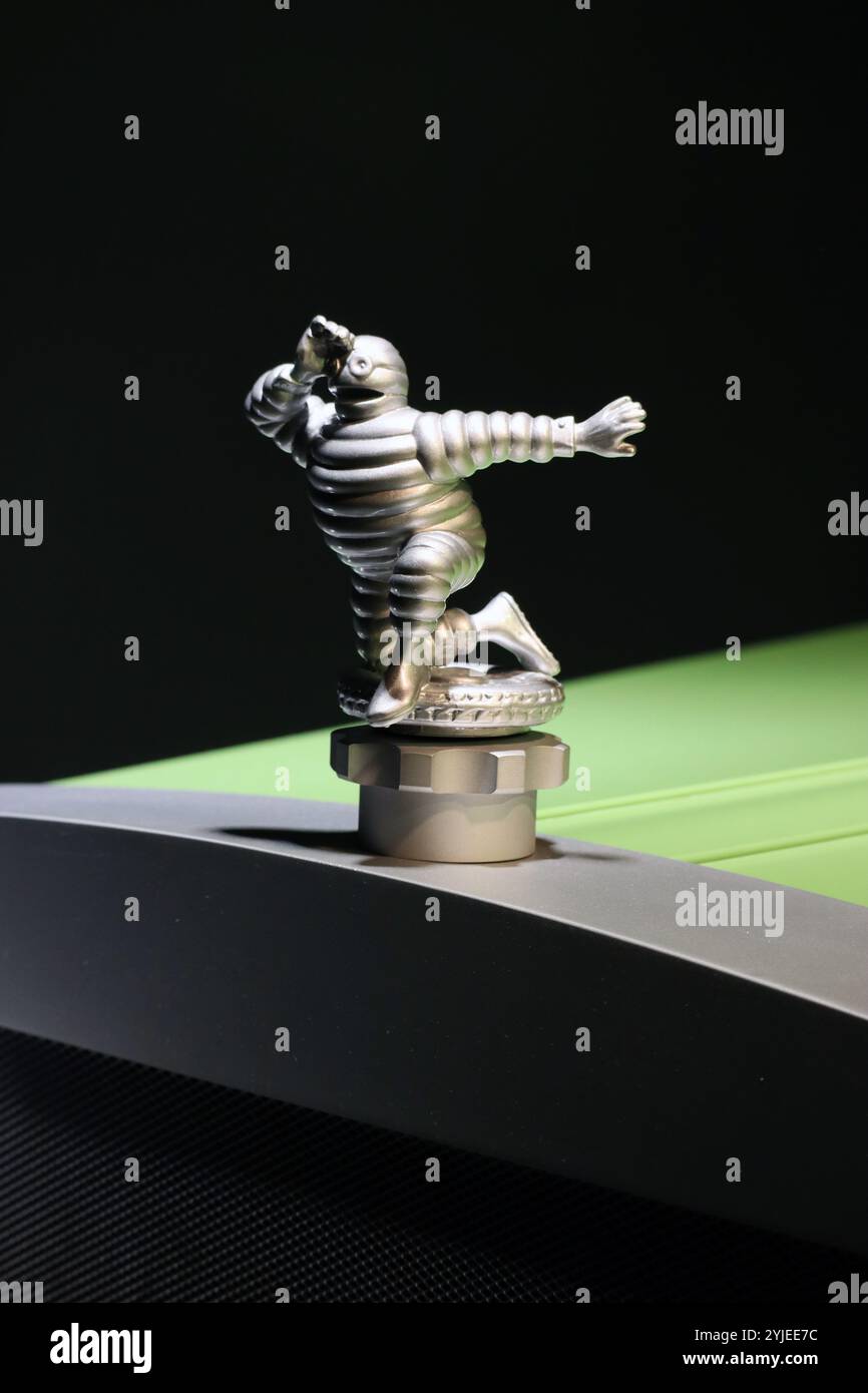 Michelin's mascot - Bibendum - on the hood of a car at the Michelin ...