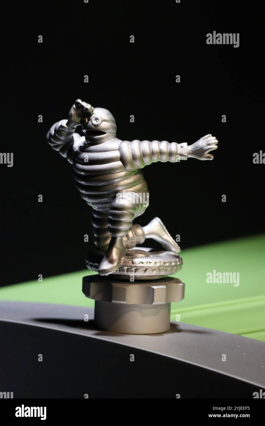 Michelin's mascot - Bibendum - on the hood of a car at the Michelin ...